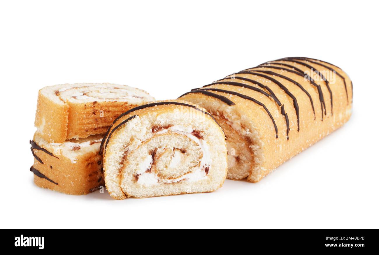 Cut sponge cake roll on white background Stock Photo - Alamy