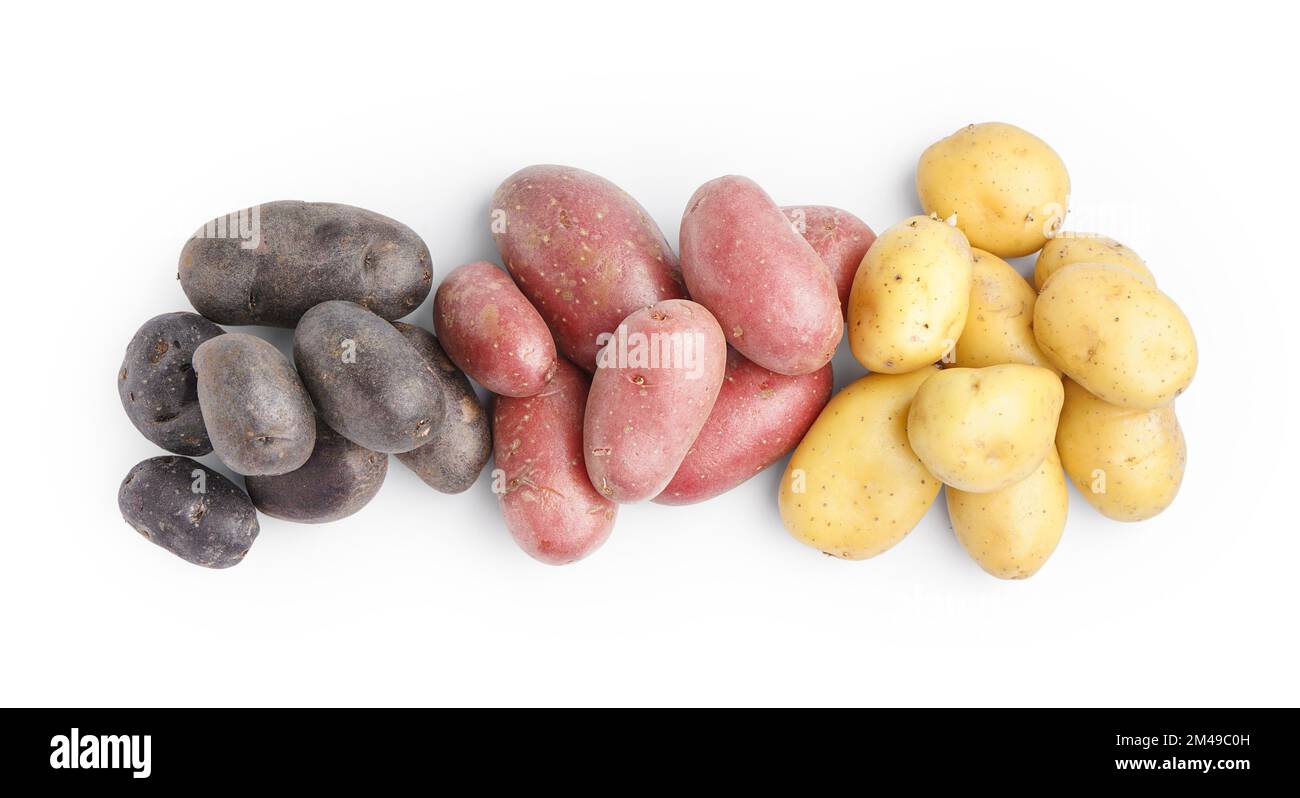 Heaps of different raw potatoes on white background Stock Photo - Alamy