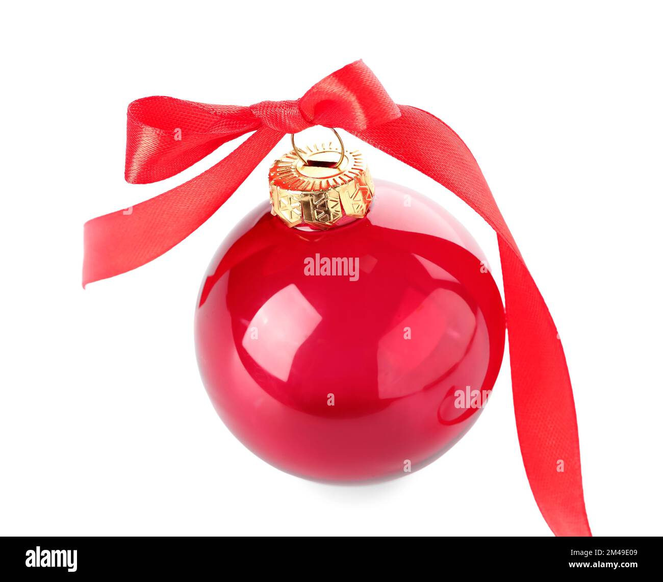 Red Christmas ball with bow on white background Stock Photo - Alamy