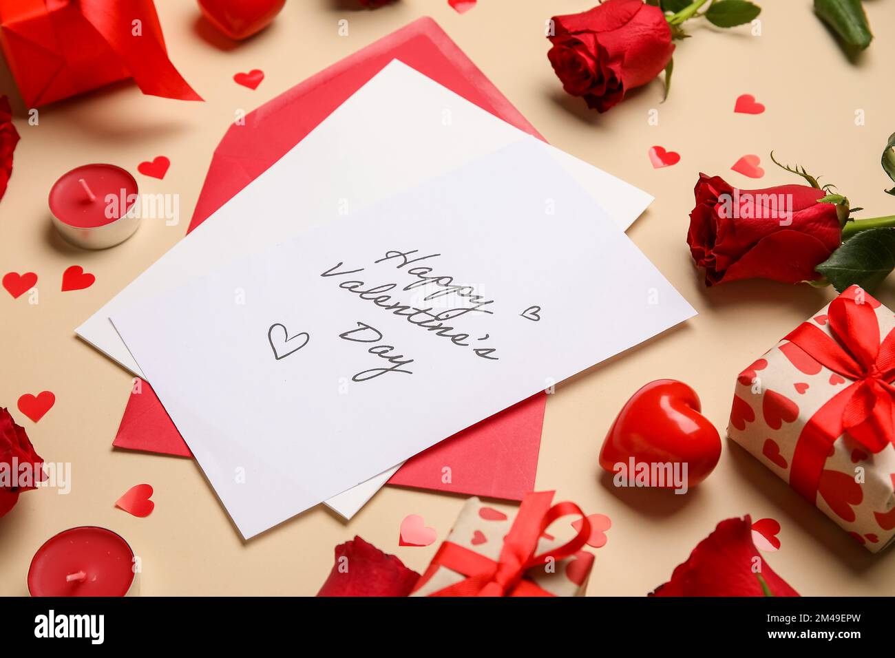 Card with text HAPPY VALENTINE'S DAY, gifts, roses and hearts on beige ...