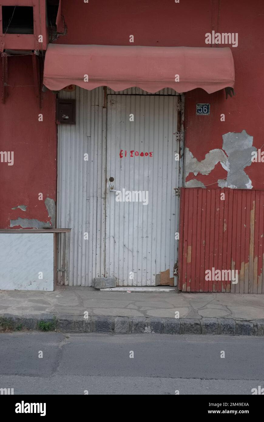old front door brightly painted Stock Photo - Alamy