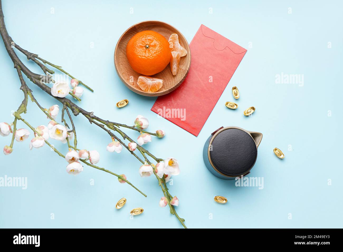 Envelope, mandarin, sakura, teapot and Chinese symbols on blue ...