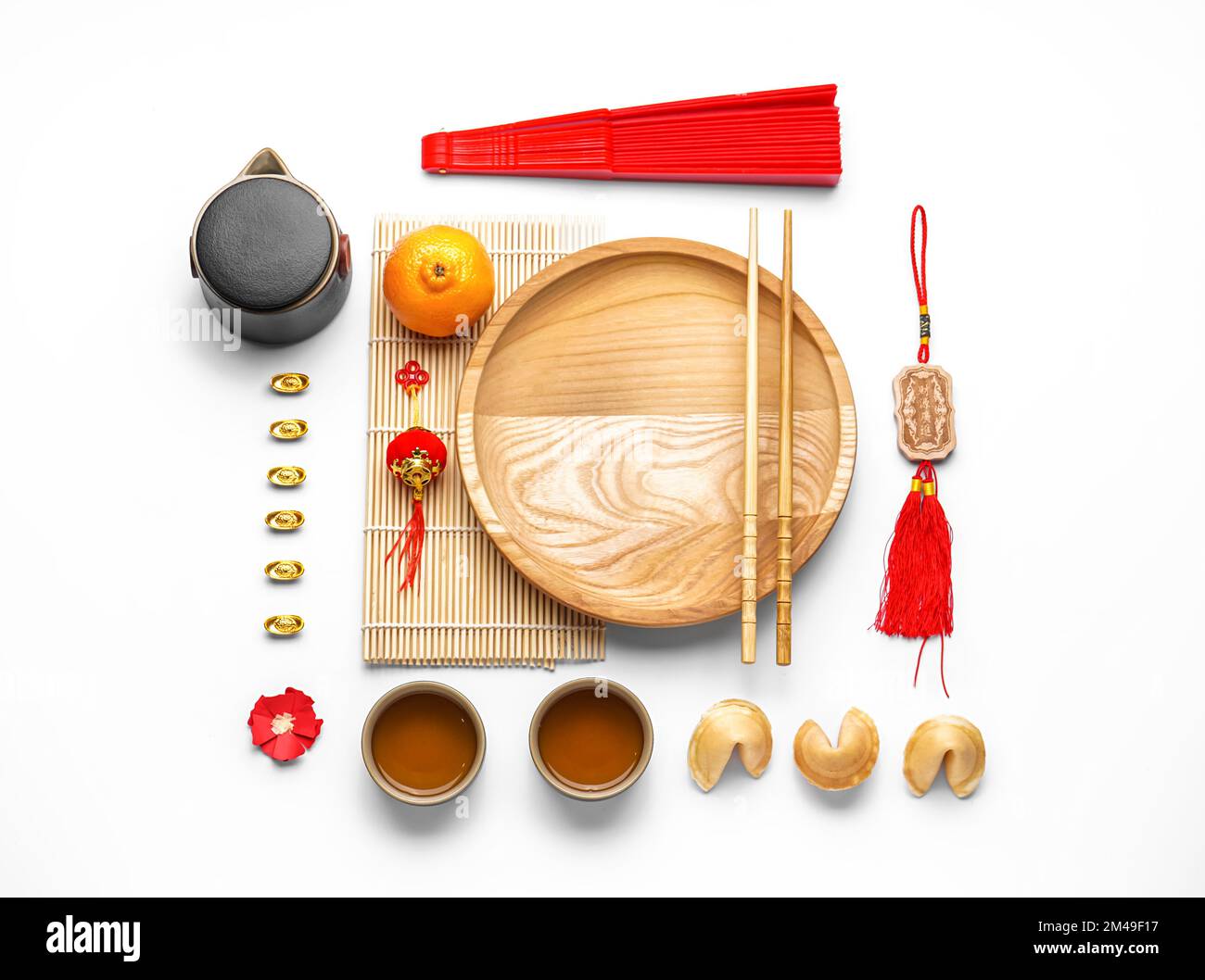 Table setting with Chinese symbols on white background. New Year ...