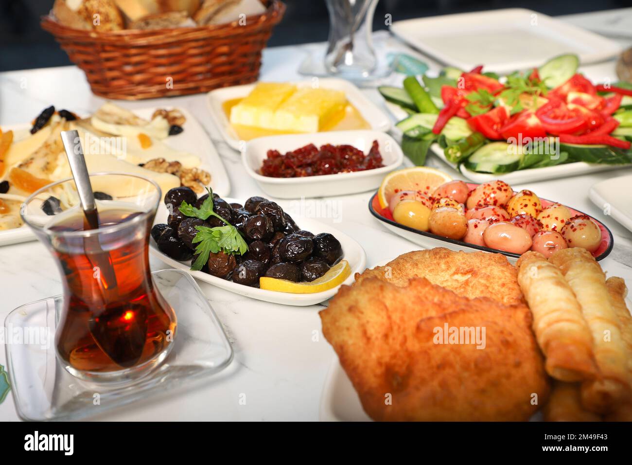 Traditional Turkish Breakfast served with traditional turkish tea on ...