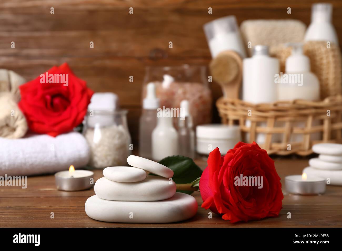 Beautiful spa composition for Valentine's Day with stones, candles and ...