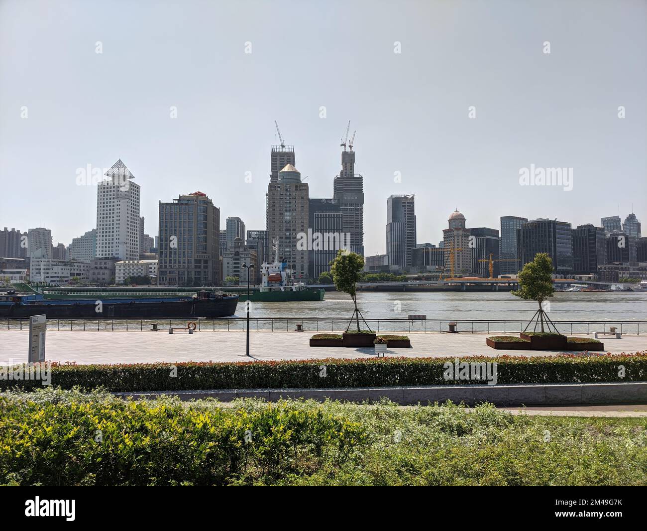 A skyline view of Puxi with the river from Pudong side in Shanghai ...
