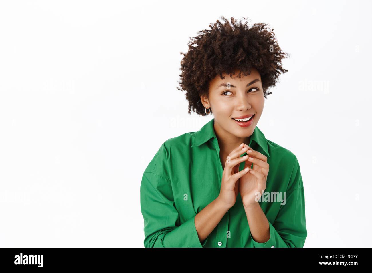 Happy smiling woman has plan, steeple fingers and scheming, thinking of ...