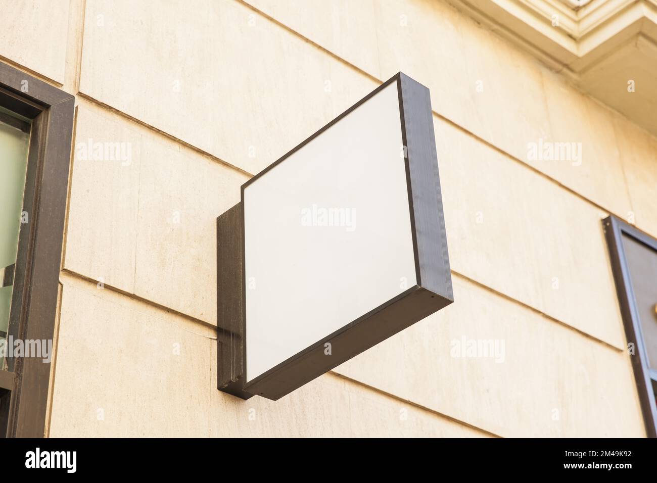 Square, white, shop, sign Stock Photo - Alamy