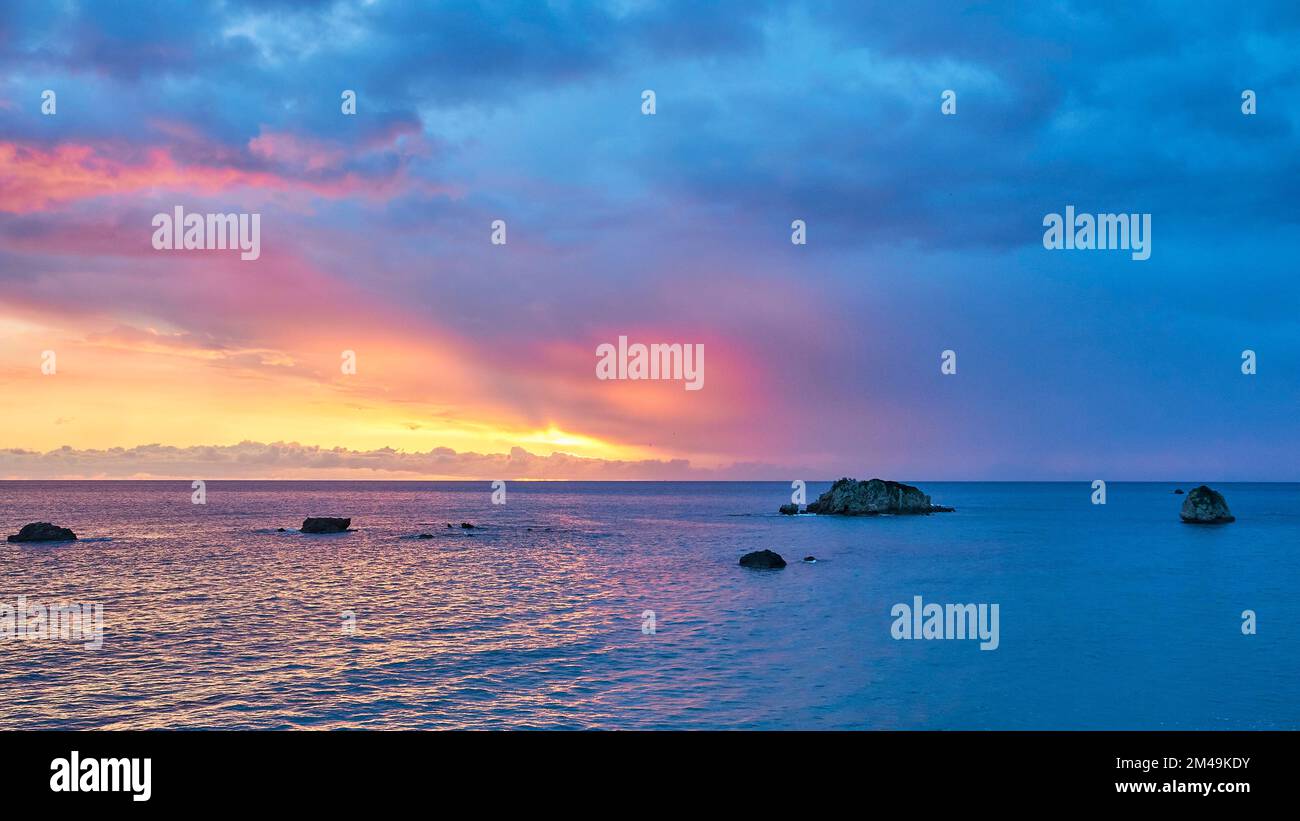 Prasoudi Beach, dusk, sunset, grey clouds, sea, offshore rocky islets ...