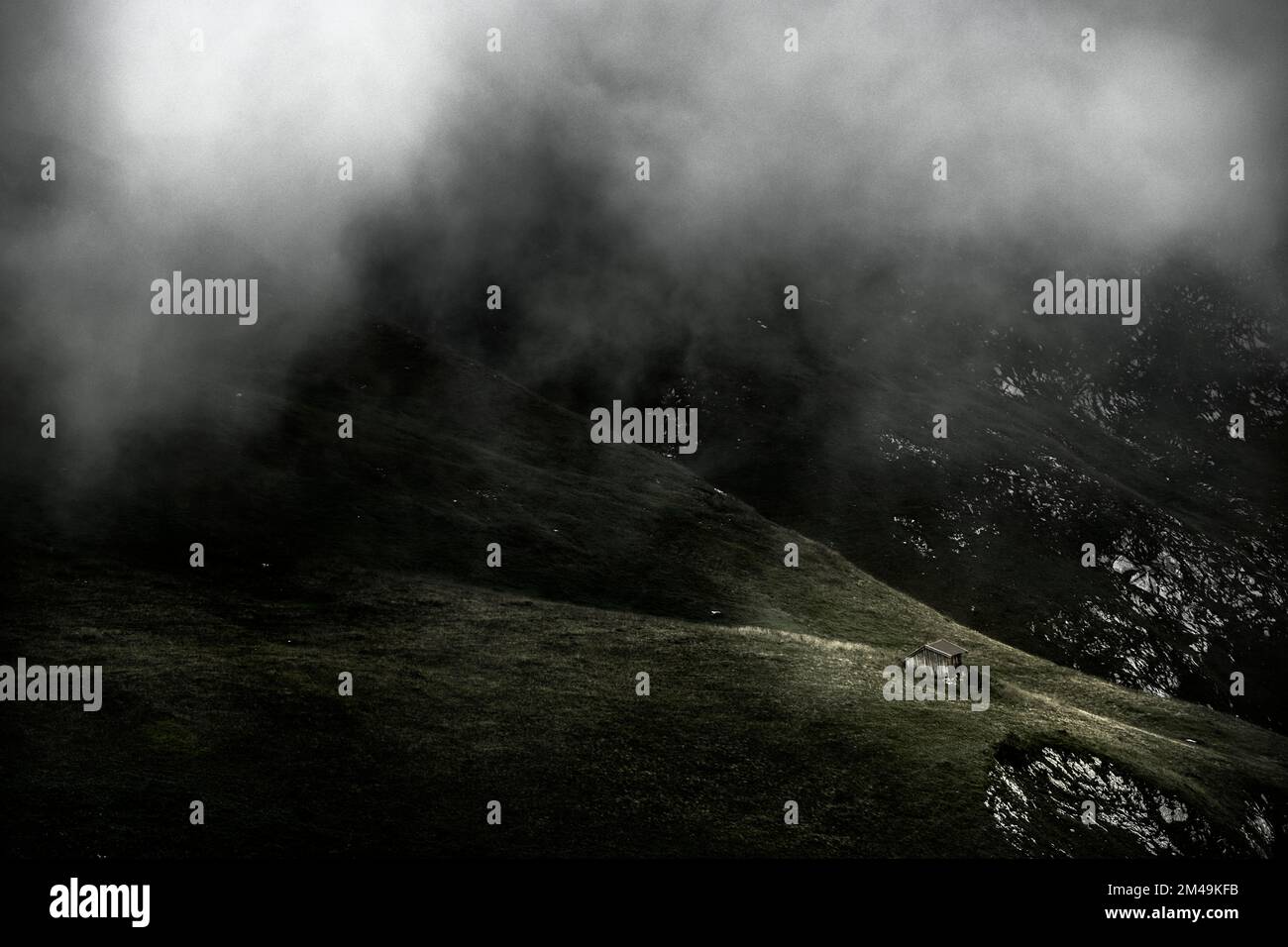 Mountain hut on mountain meadow with remains of fog, stream, Lechtal ...