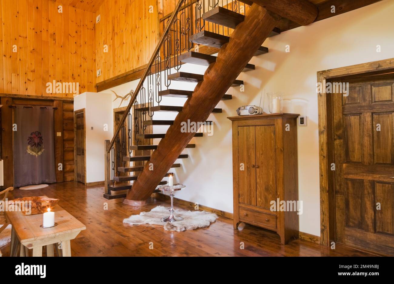 Wooden beam staircase leading to upstairs floor from ground floor ...