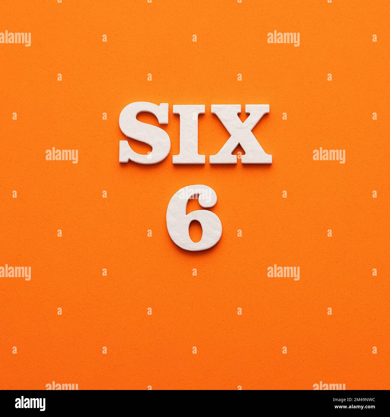 In white letters the word six on an orange background Stock Photo - Alamy