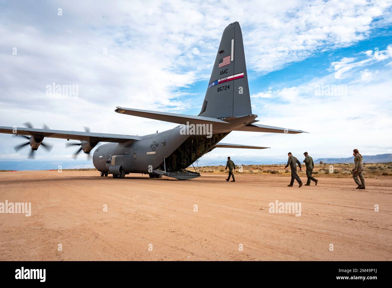 U.S. Airmen from the 40th Airlift Squadron board a C-130J Super Hercules for take off after ...