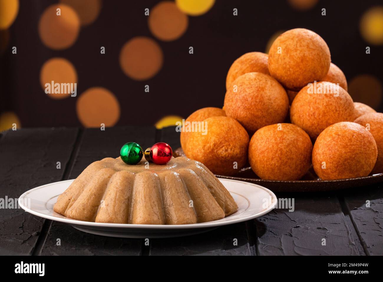 Traditional Colombian christmas food - Buñuelos y natilla Stock Photo ...