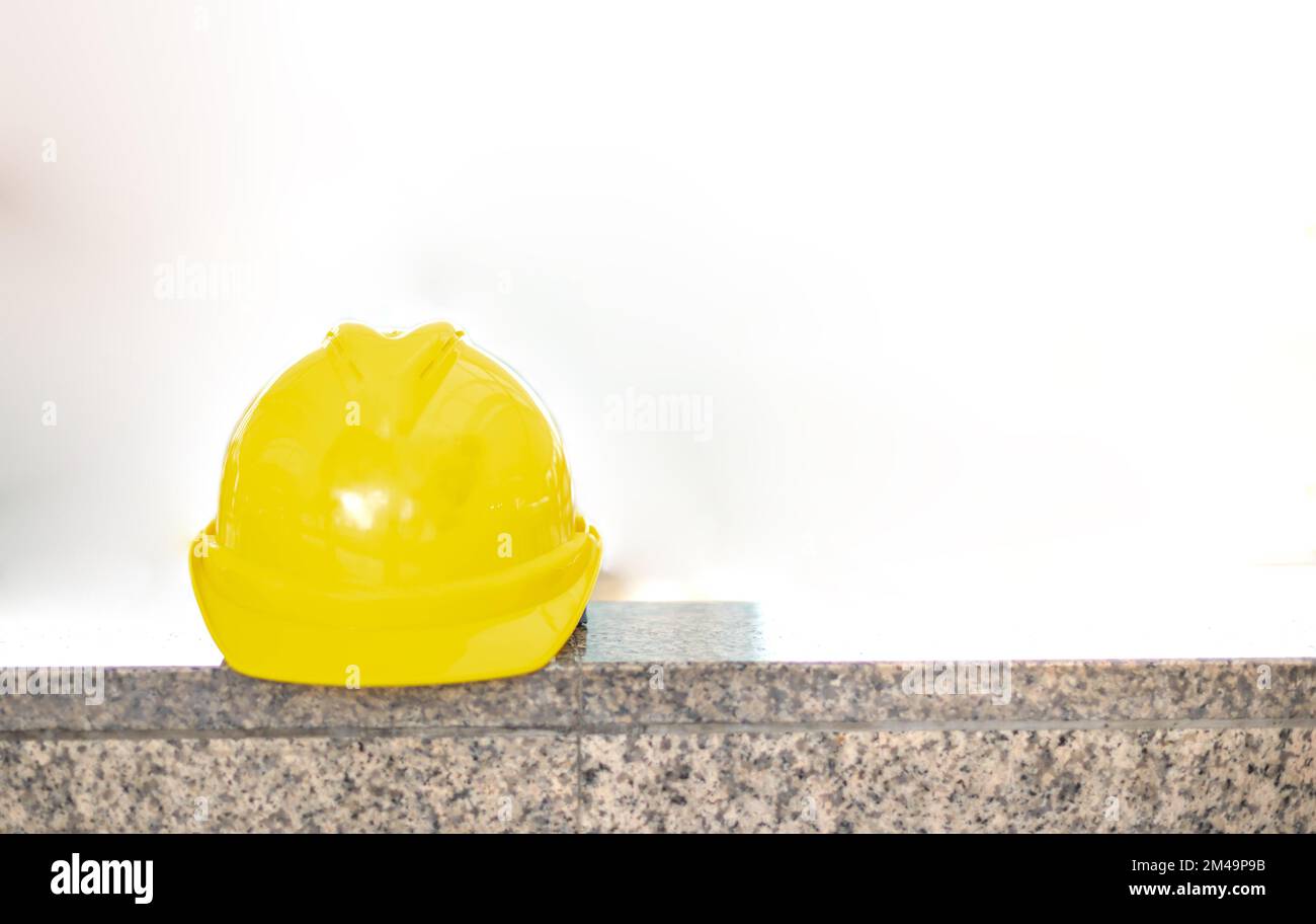 The yellow hard safety helmet hat is for safety projects of workmen as ...
