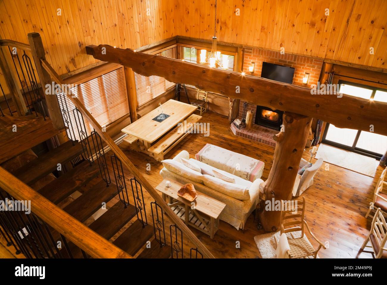 View of ground floor dining, living room areas from upstairs floor ...