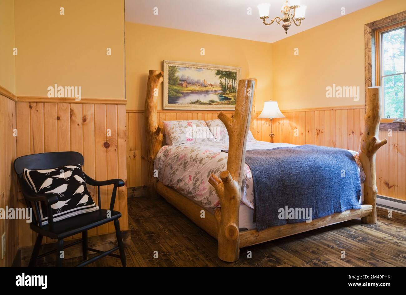 Rustic four poster bed in upstairs guest bedroom with nuanced brown ...