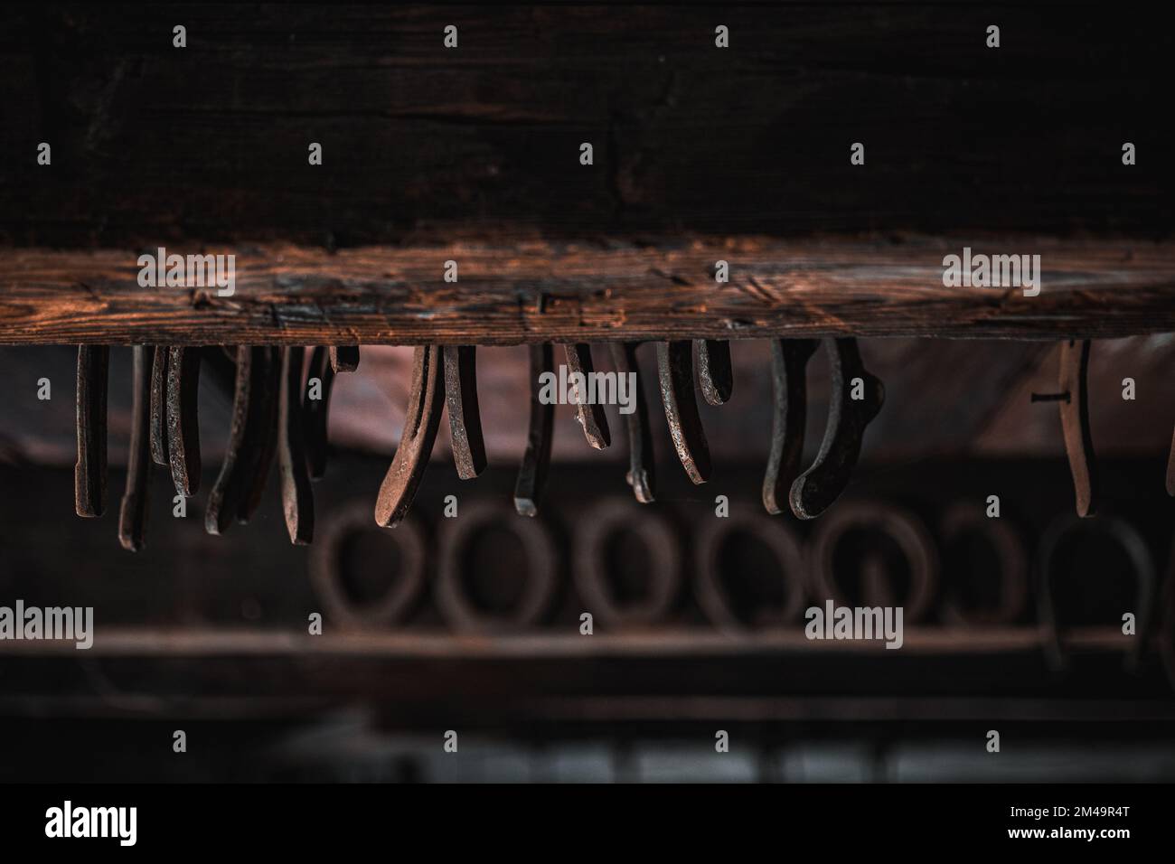 The old-fashioned hanging metal parts and mechanisms near the window in ...
