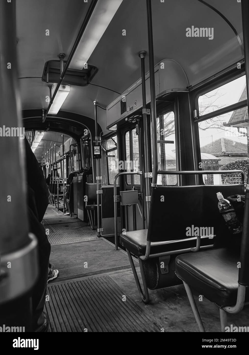 A beautiful grayscale view of empty seats of public bus Stock Photo - Alamy