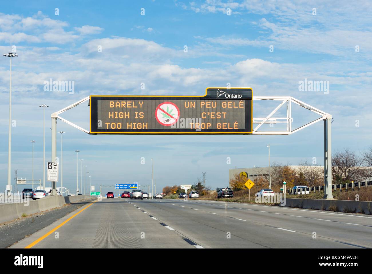 Barely High Is Too High warning road sign in Toronto, Ontario, Canada ...