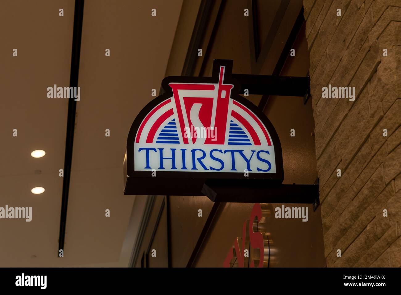 Houston, Texas, USA - March 6, 2022: Thirsty's Bar and Grill projecting sign at a shopping mall ...