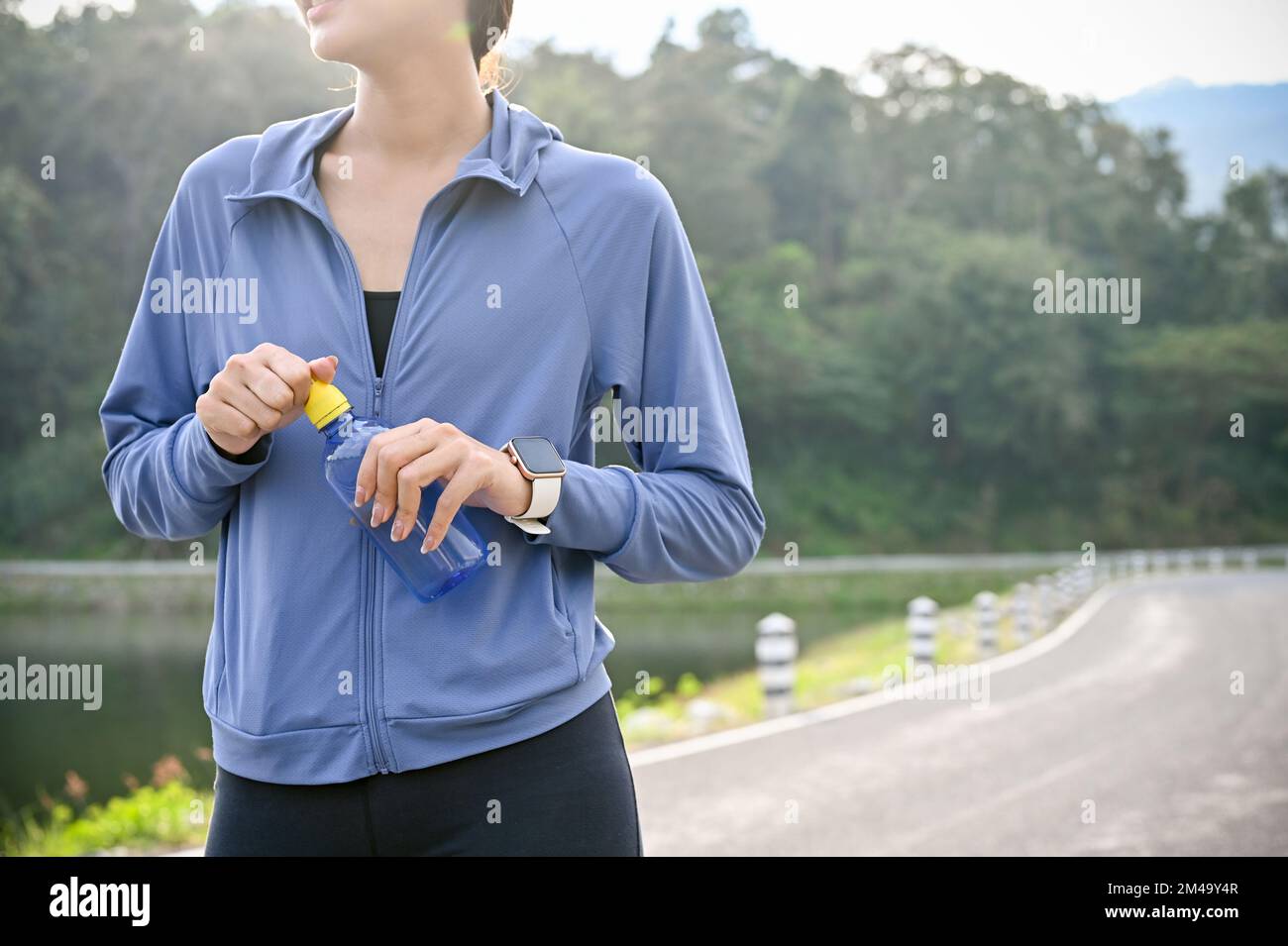 Sweaty runner drinking hi-res stock photography and images - Alamy