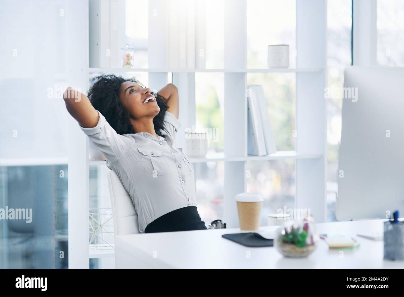 She knows how to get the job done right. a young businesswoman taking a ...