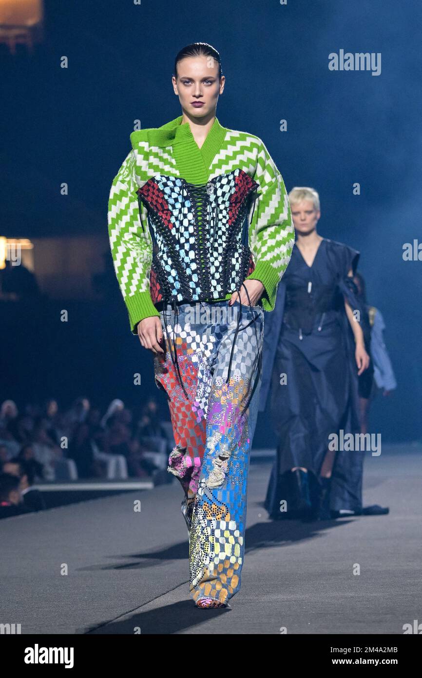 A model presents a creation during Qatar Fashion United event, where ...