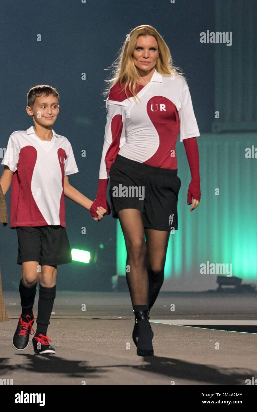Spanish model and actress Esther Canadas (right) presents a creation ...