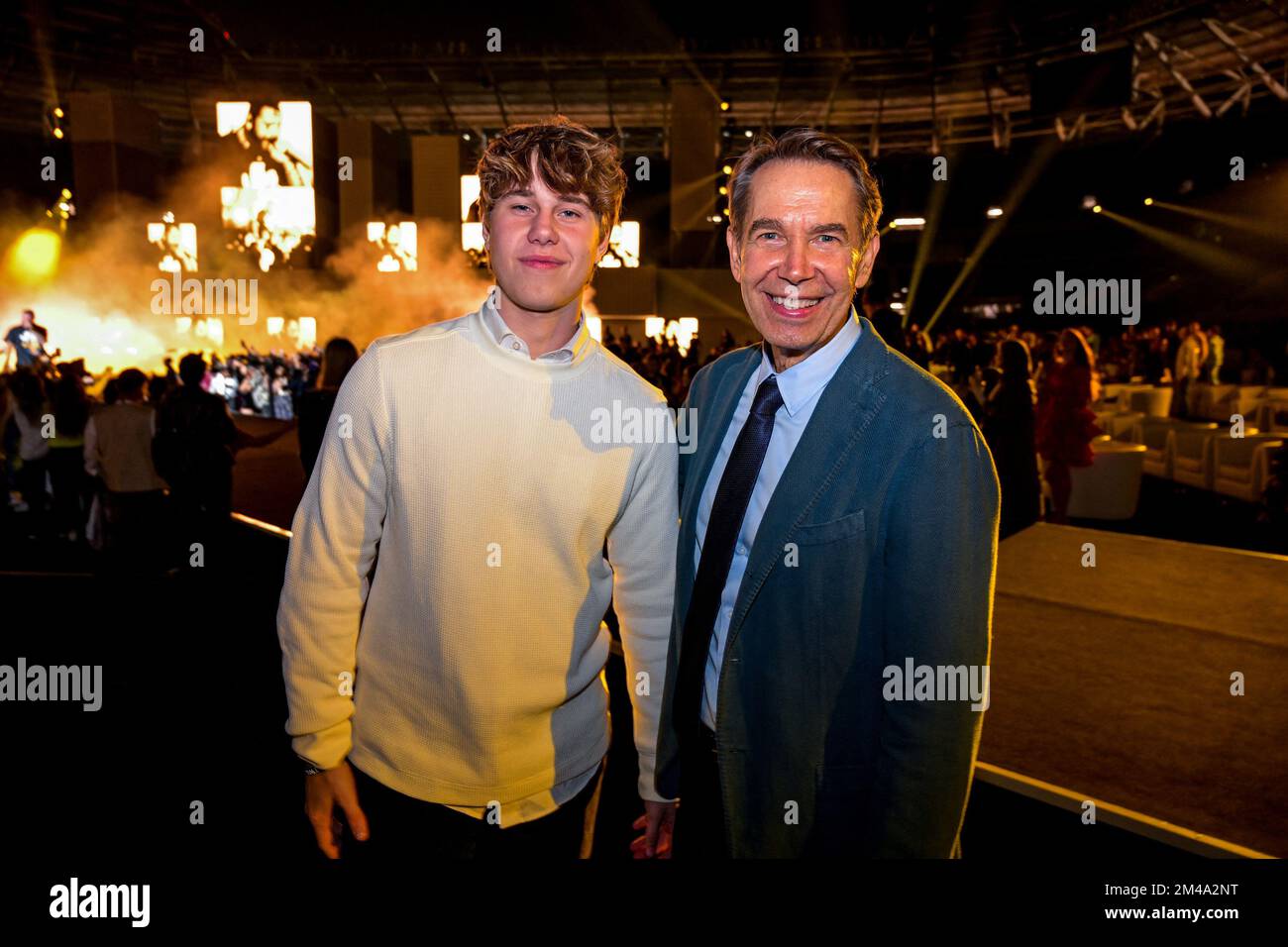 American artist Jeff Koons poses with one of his sons during Qatar ...