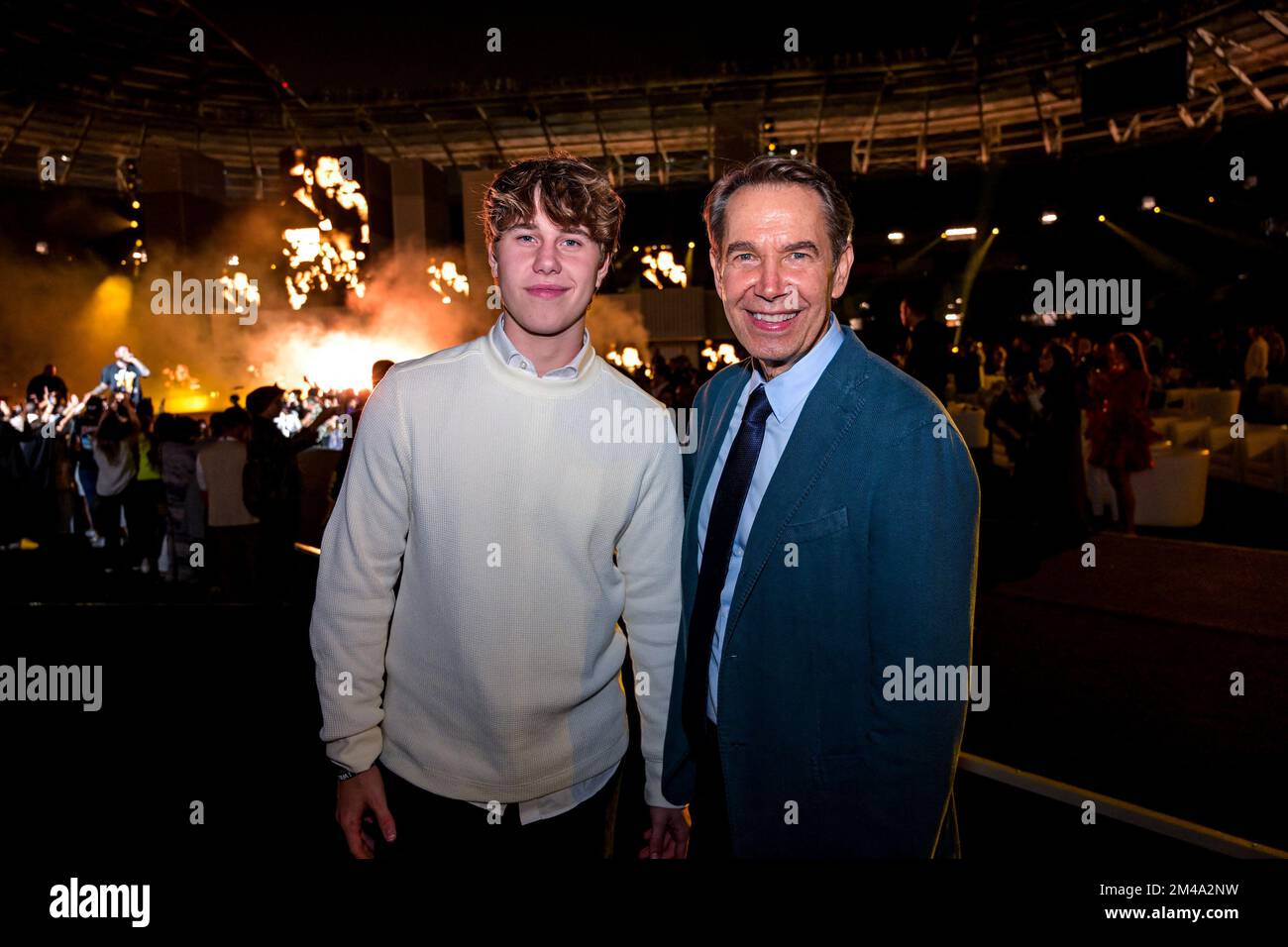 American artist Jeff Koons poses with one of his sons during Qatar ...