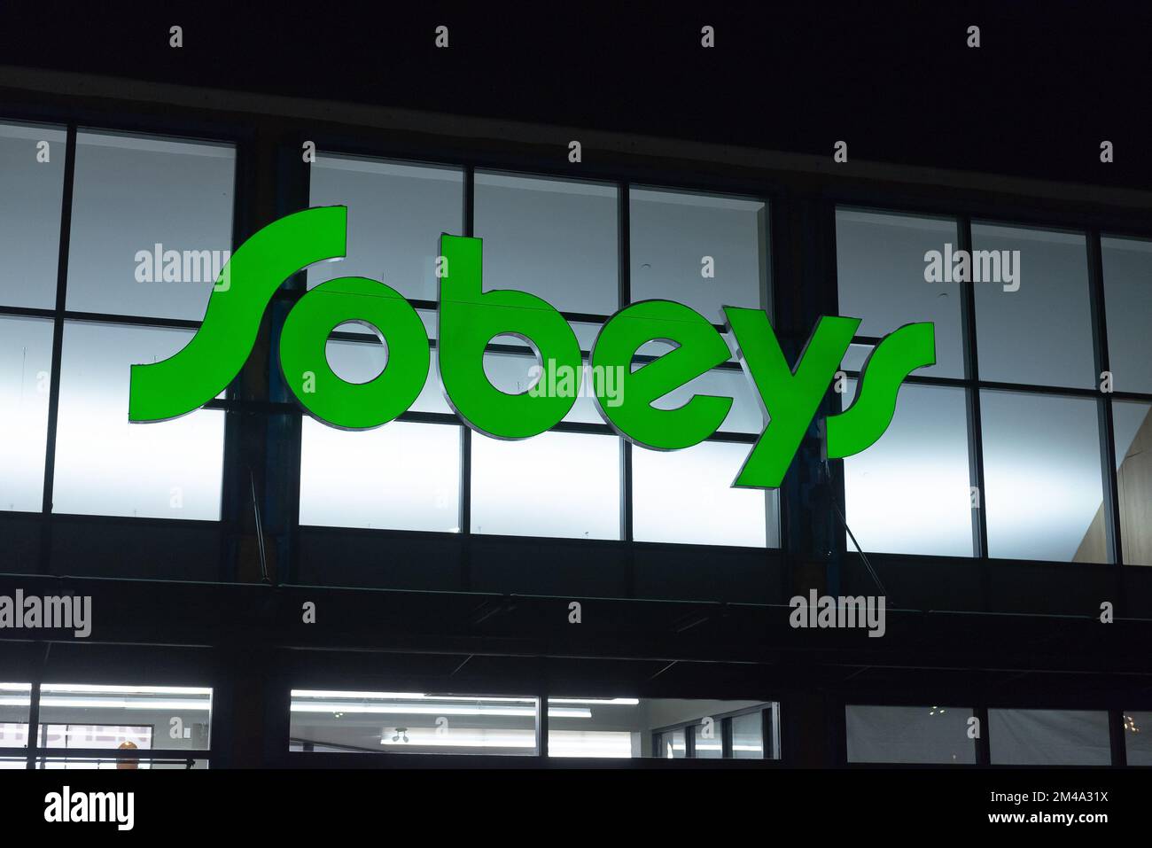 Toronto, ON, Canada - December 19, 2022: The logo and brand sign on the ...