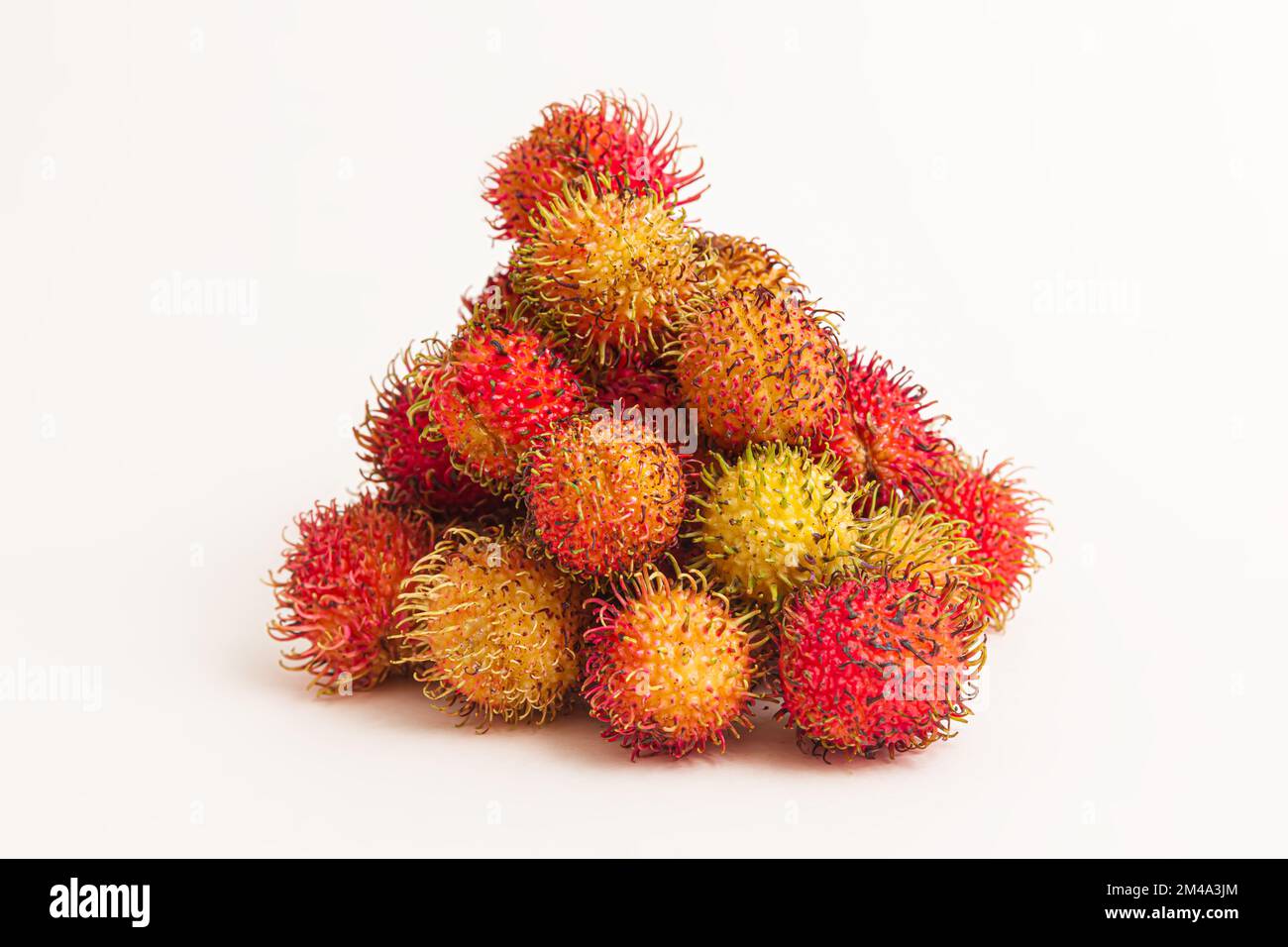 Group of red rambutan sweet delicious fruit isolated on white ...