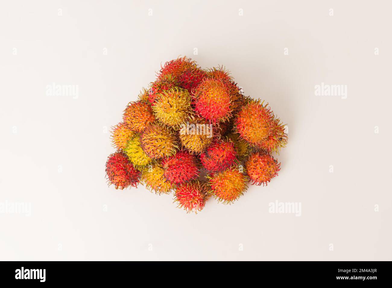 Group of red rambutan sweet delicious fruit isolated on white ...
