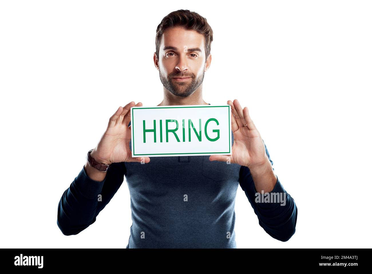 Theres a spot open. Studio portrait of a handsome young man holding a ...