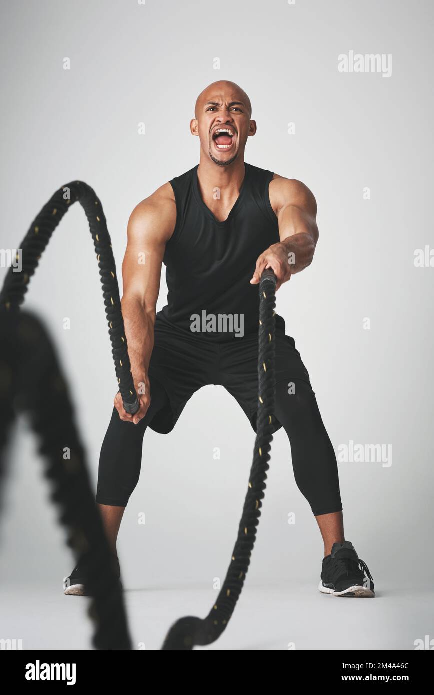 Athletic man working out battle hi-res stock photography and images - Alamy