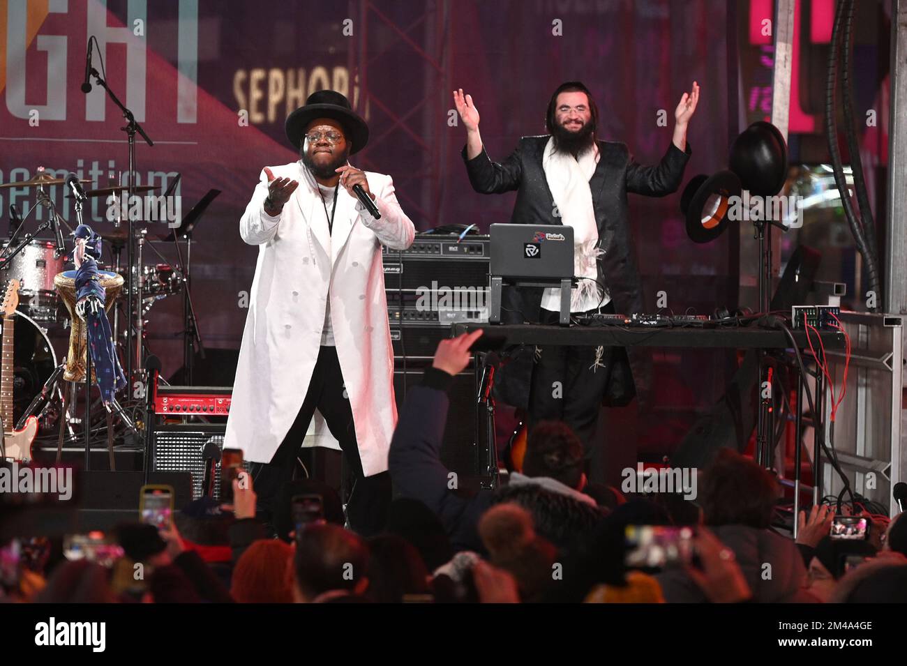 New York, USA. 19th Dec, 2022. Rapper Nissim Black (l) performs during ...