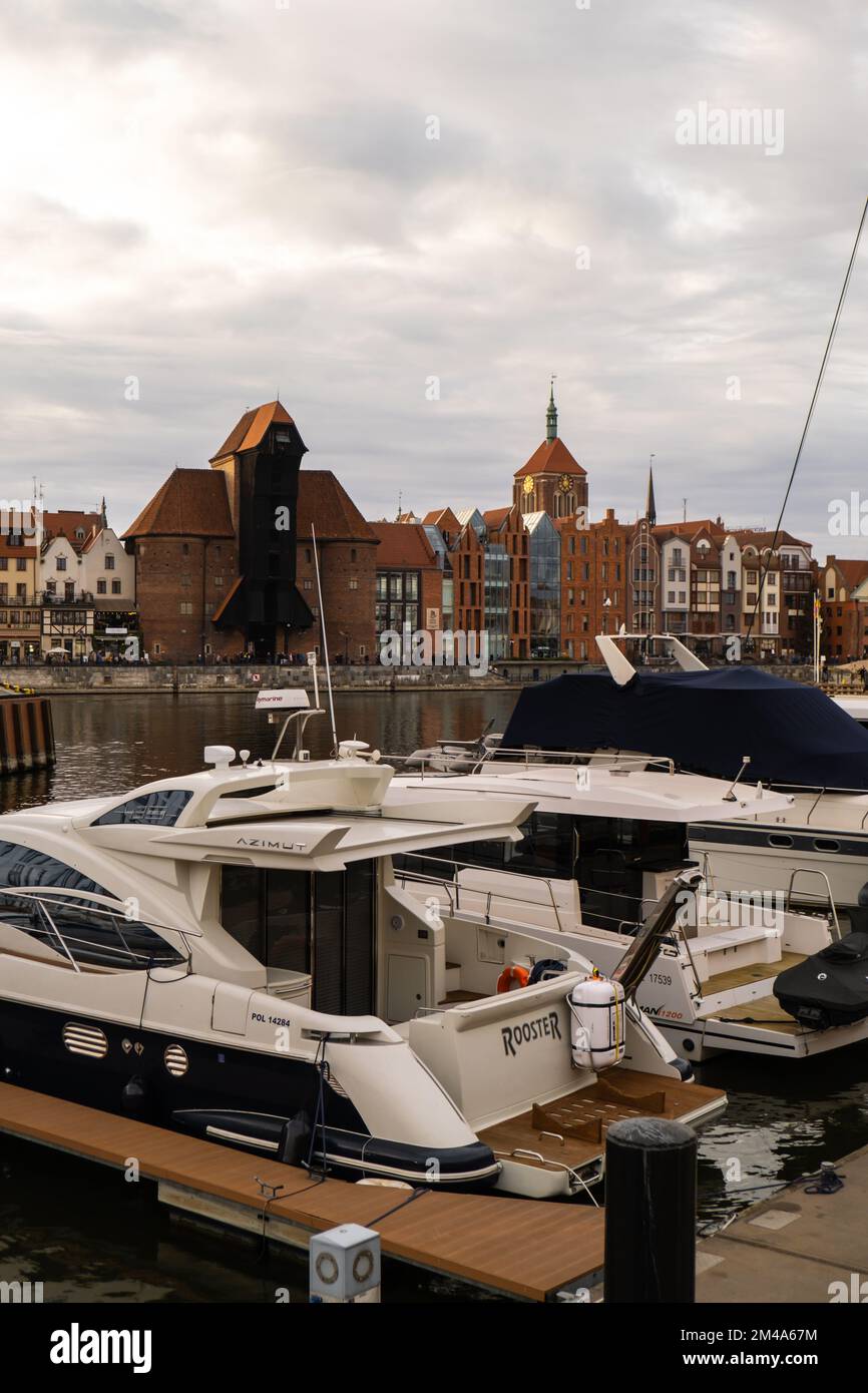 Ancient crane - zuraw Old town in Gdansk. The riverside on Granary ...