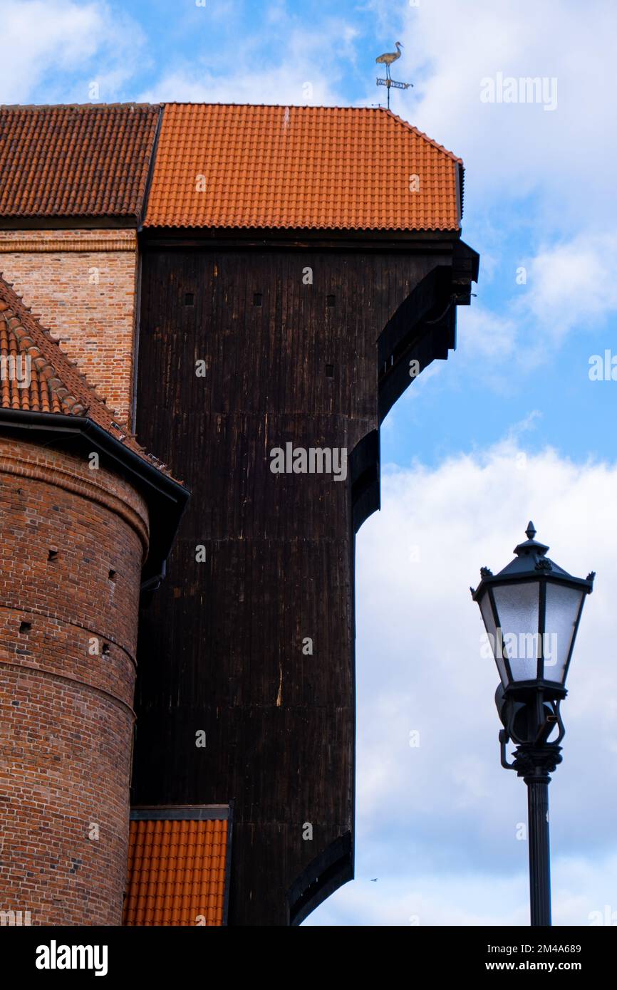 Ancient crane - zuraw Old town in Gdansk. The riverside on Granary ...