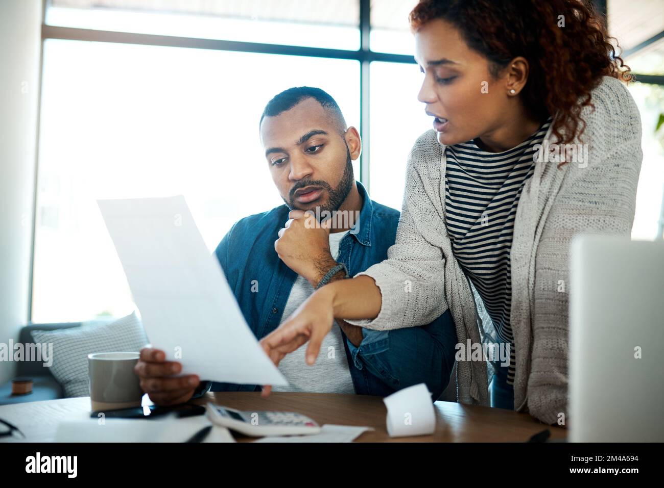 Financial management is so important. a young couple planning their ...