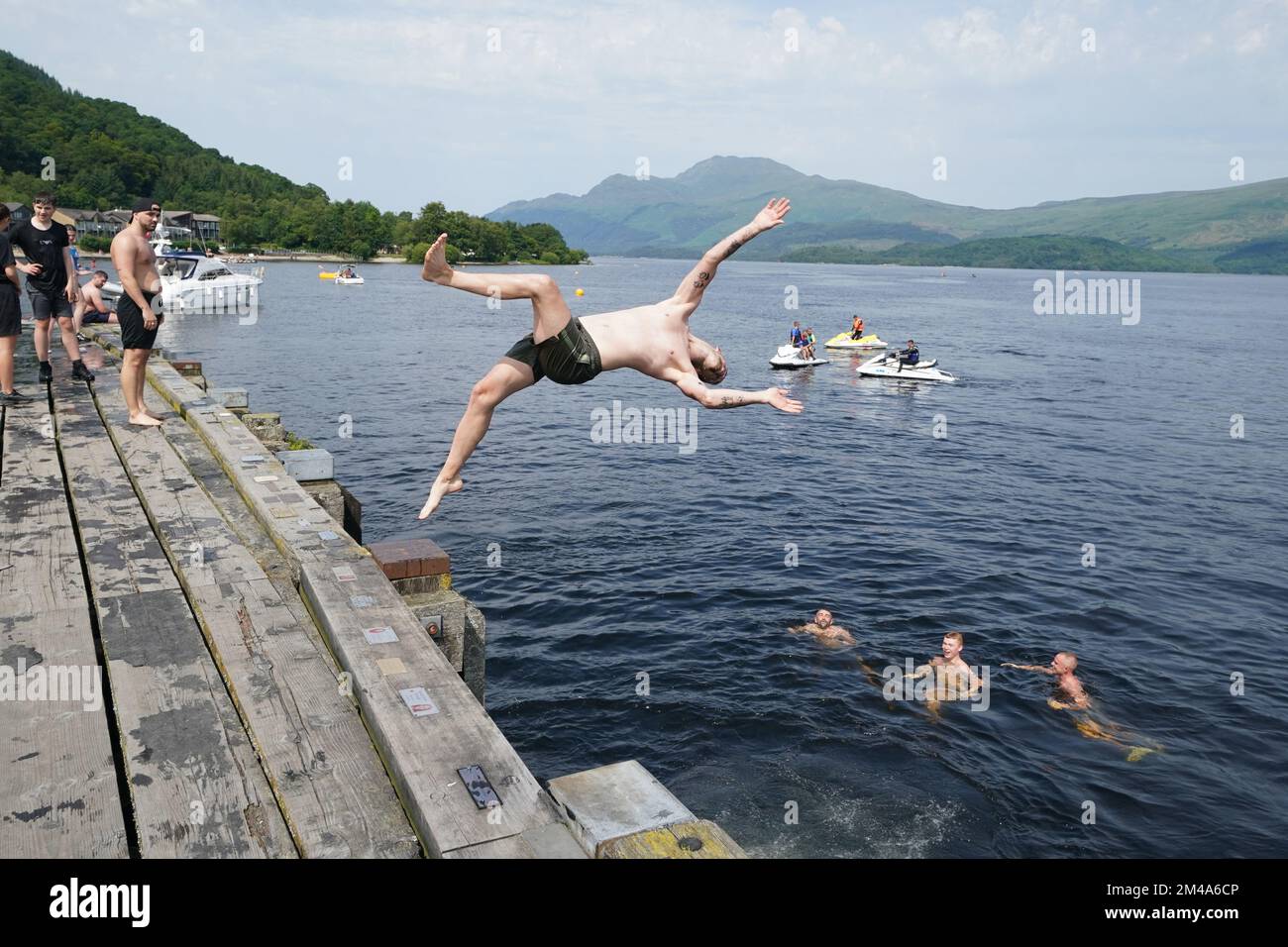 PA REVIEW OF THE YEAR 2022 File photo dated 19/07/22 - People jump from ...