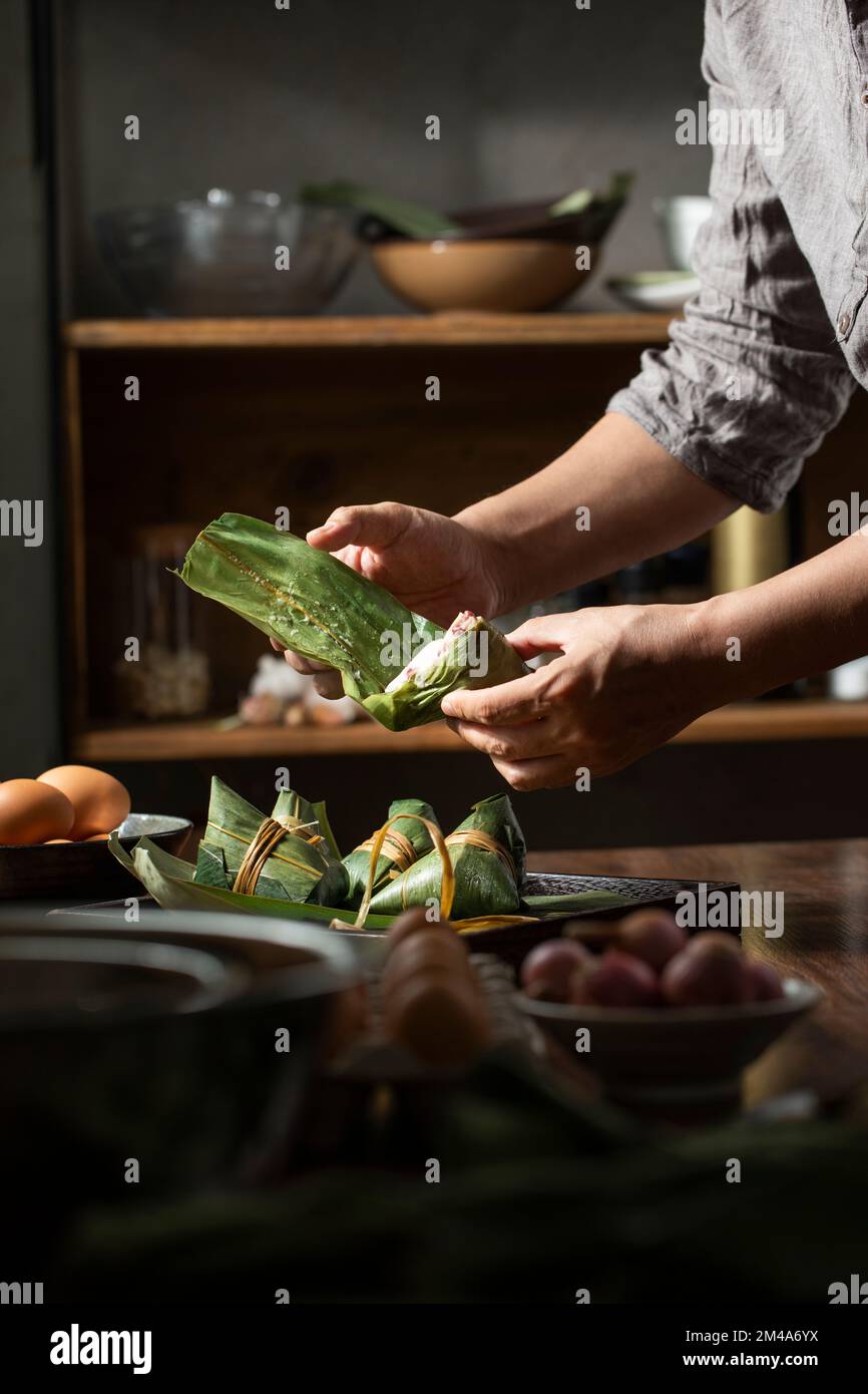 Making Zongzi for Duanwu festival Stock Photo - Alamy