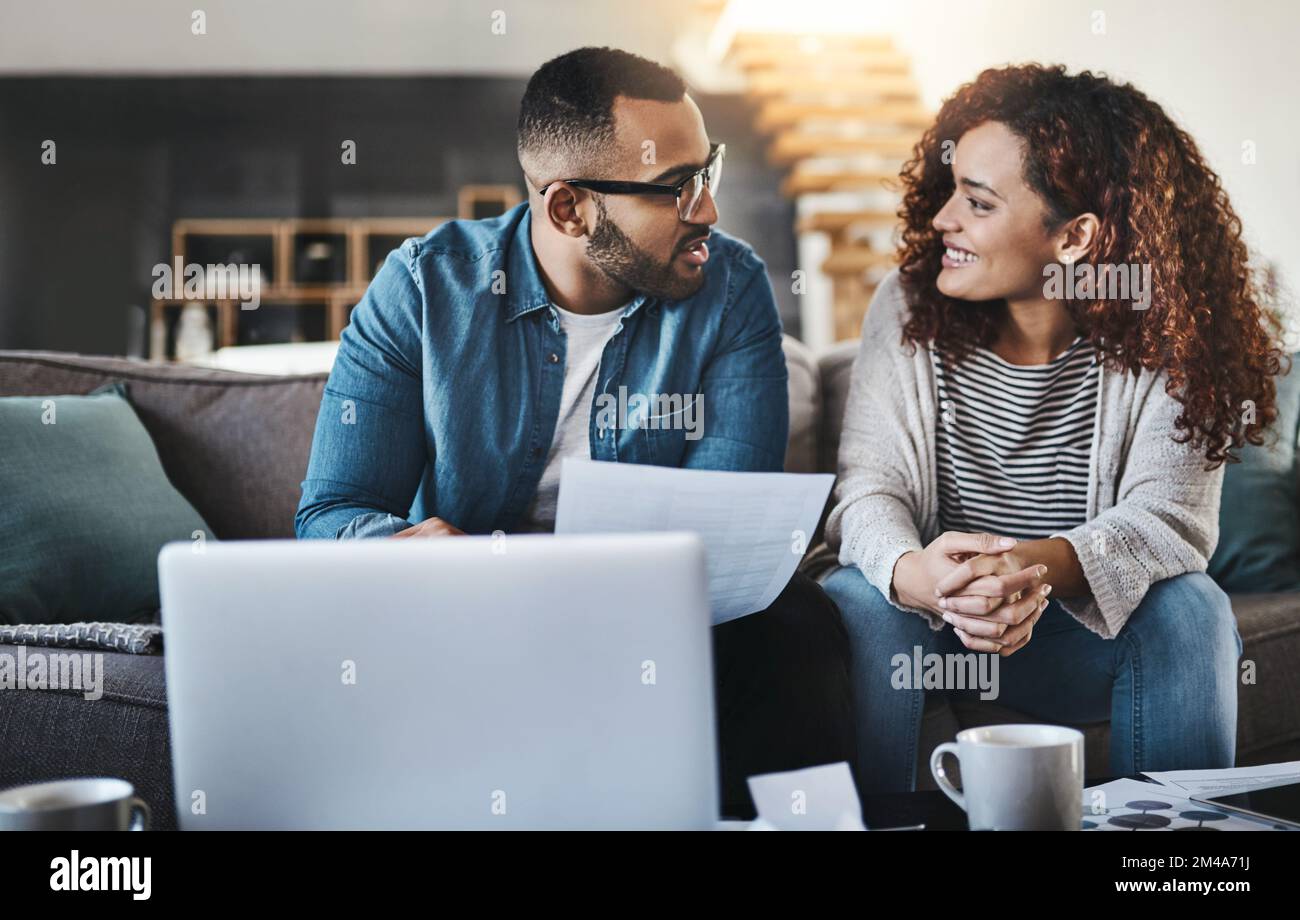 We make better choices together. a young couple planning their budget ...
