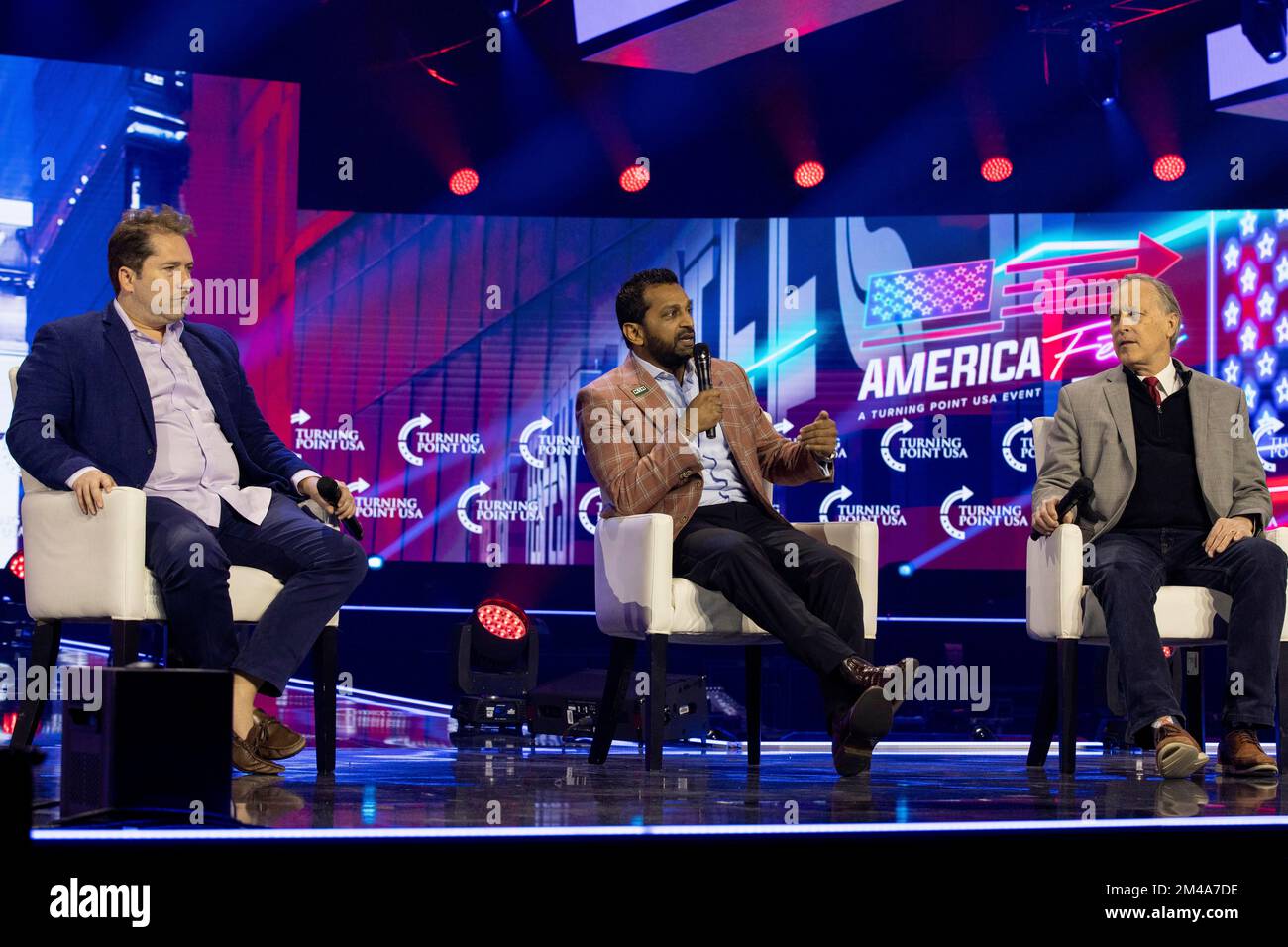 A panel with (L-R) Darren Beattie, Kash Patel, and Andy Biggs ...