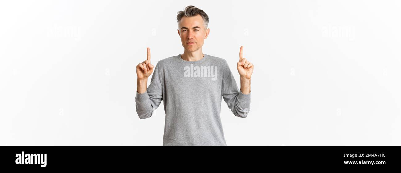 Image of thoughtful and unsure adult man, squinting hesitant while ...