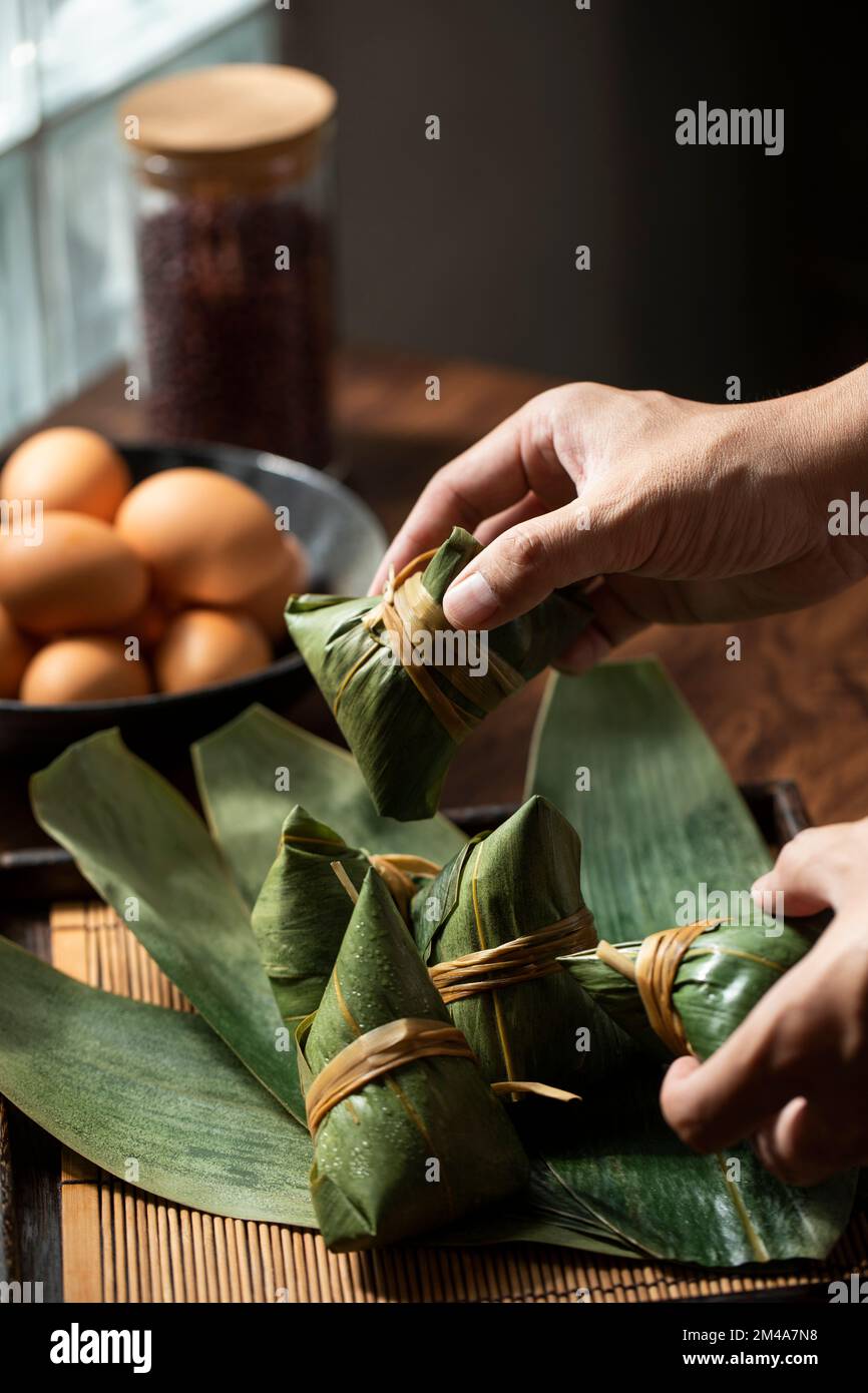 Making Zongzi for Duanwu festival Stock Photo - Alamy