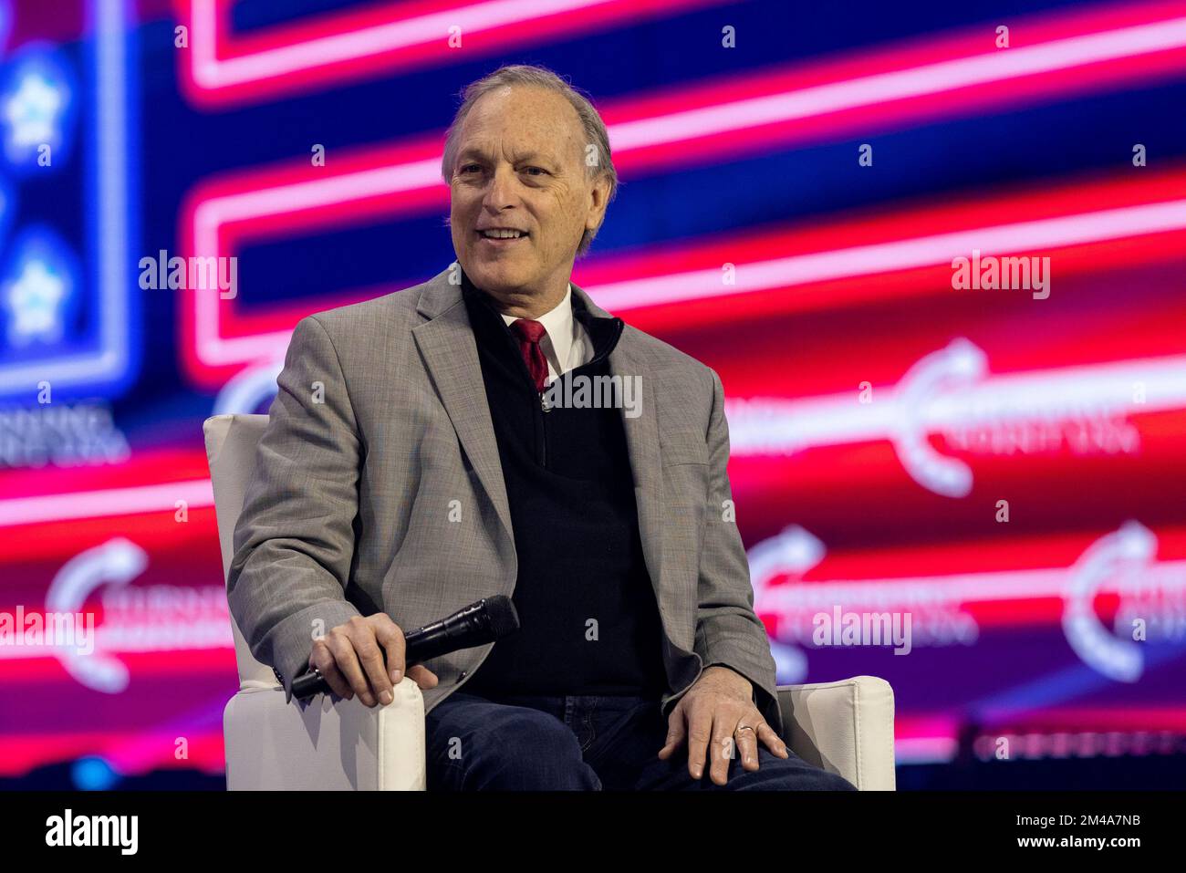 A panel with (L-R) Darren Beattie, Kash Patel, and Andy Biggs ...