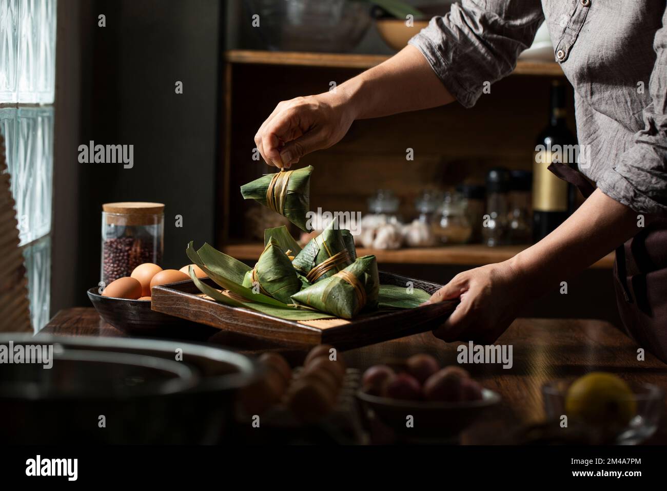 Making Zongzi for Duanwu festival Stock Photo - Alamy