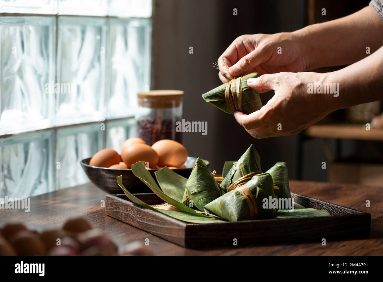 Making Zongzi for Duanwu festival Stock Photo - Alamy