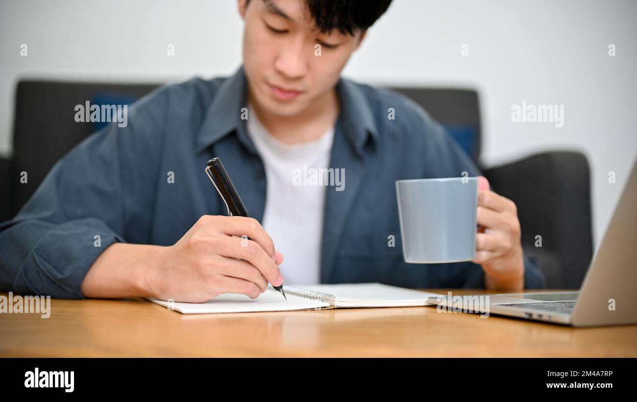 Student doing homework taking notes hi-res stock photography and images ...
